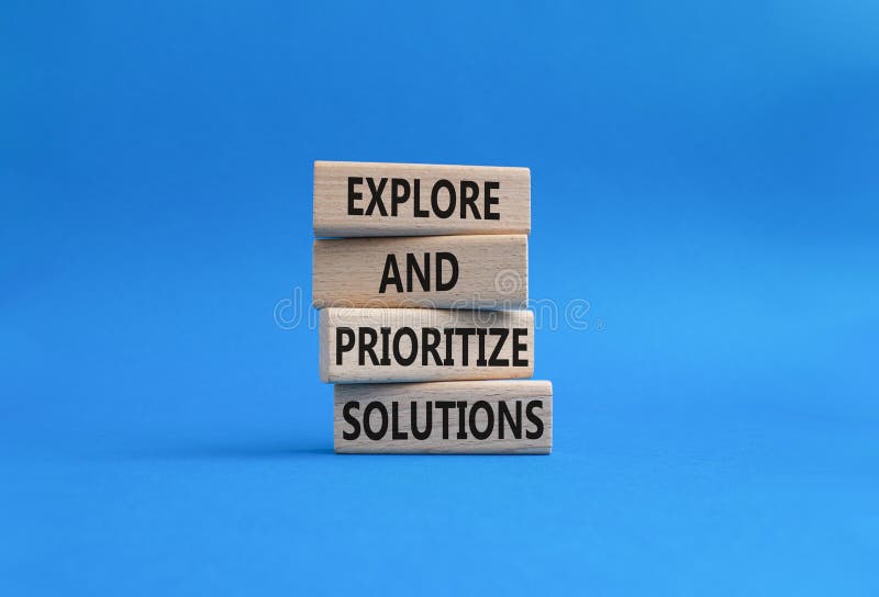 Solution Symbol. Wooden Blocks with Words Explore and Prioritize ...