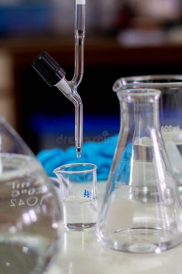 Laboratory Glassware with Green Liquid in a Science Research Laboratory ...