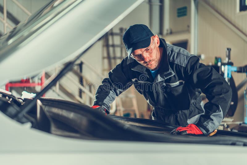 Solving Car Engine Problems Stock Photo - Image of work, servicing ...