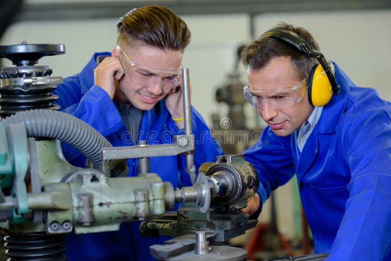 Solving the Machine Problem Stock Photo - Image of maintenance, goggles ...