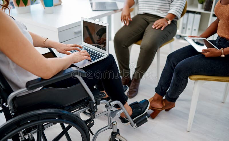 Solving Problems with a Diverse Team. a Businesswoman with Disabilities ...