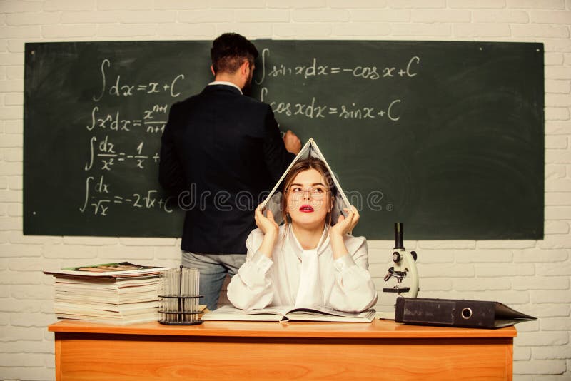 Solving Task. Man Writing on Chalkboard Math Formulas. Teaching in ...
