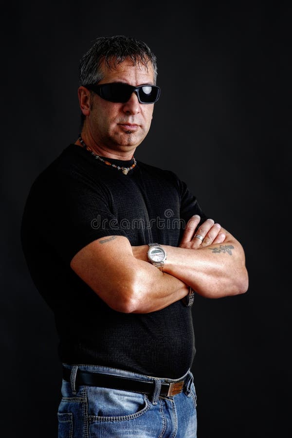 Somber tough guy stock image. Image of aged, person, fist - 27930663