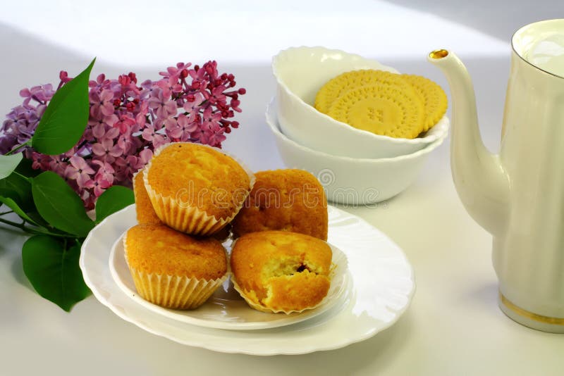 Some Appetizing Cakes, Biscuits and Lilac Flowers Stock Image - Image ...