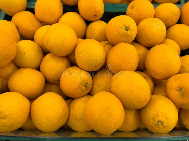 Some Areas of the Shelf Have Oranges Placed. Stock Image - Image of ...