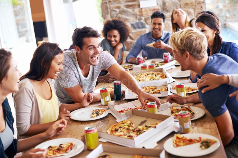 This is Some Awesome Pizza. a Group of Friends Enjoying Pizza Together ...