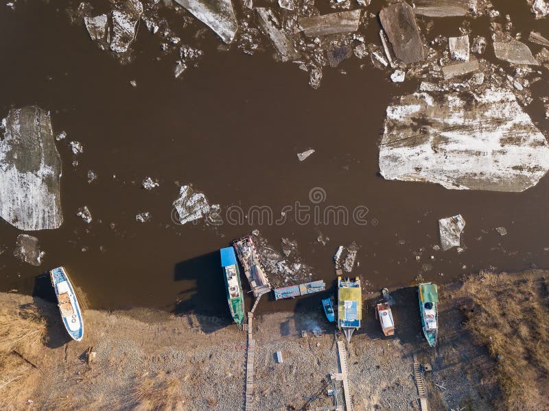 Some Boats on the River Bank while the Ice Drift in Spring Time Stock ...