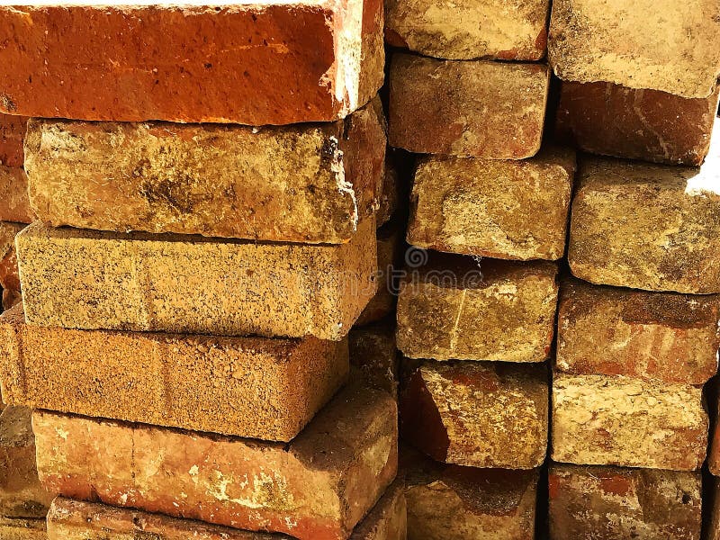 The Bricks are Stacked on Wooden Pallets and Prepared for Sale. Clay ...
