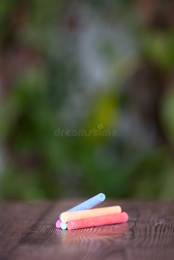 Some chalk on the table stock image. Image of composition - 230474869