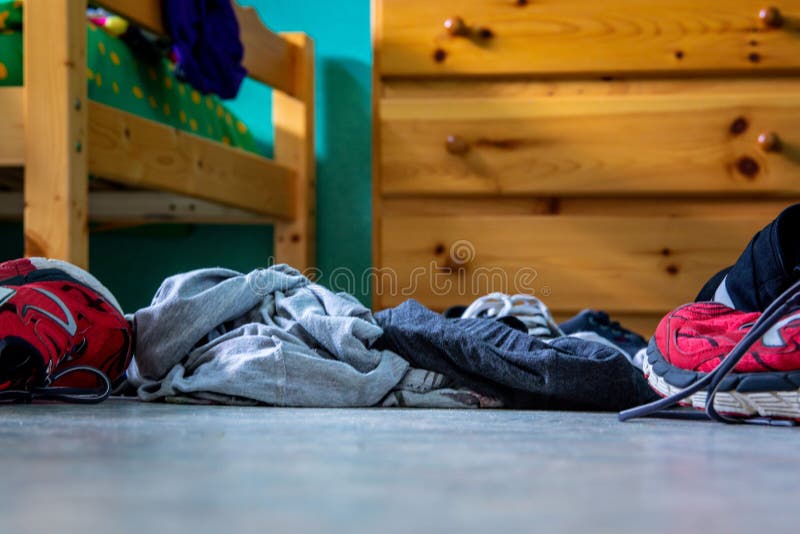 Clothes Thrown at the Ground of a Messy Room Stock Photo - Image of ...