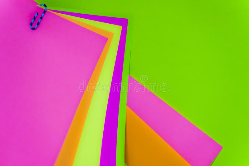 Some Colored Paper Bags with a Blue Clip Stock Photo - Image of ...