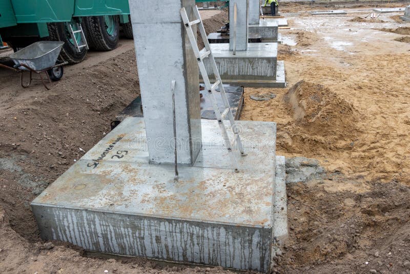 Some Concrete Columns for a Factory Building are Erected on a Large ...
