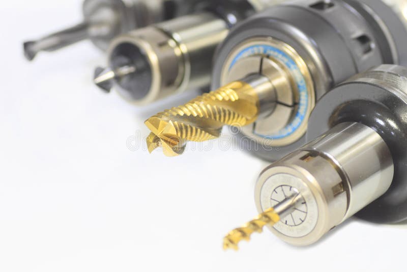Some Endmills and Tap on White Background Stock Photo - Image of close ...