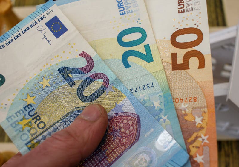 Some euro notes in my hand stock image. Image of investment - 276202883