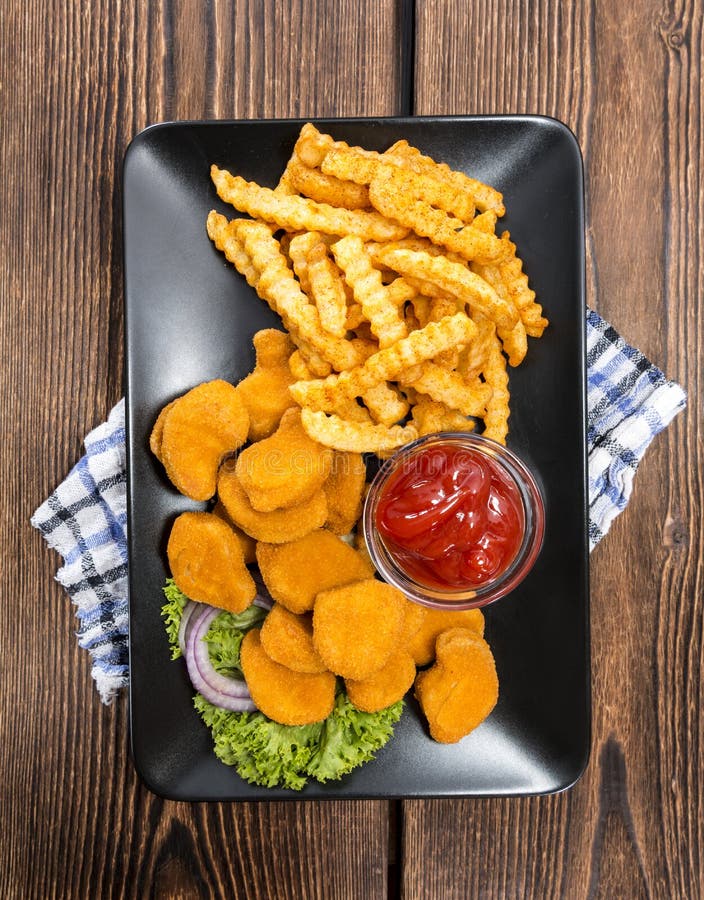 Some Fresh Made Chicken Nuggets (with Chips) Stock Image - Image of ...