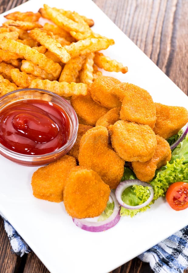 Some Fresh Made Chicken Nuggets (with Chips) Stock Image - Image of ...