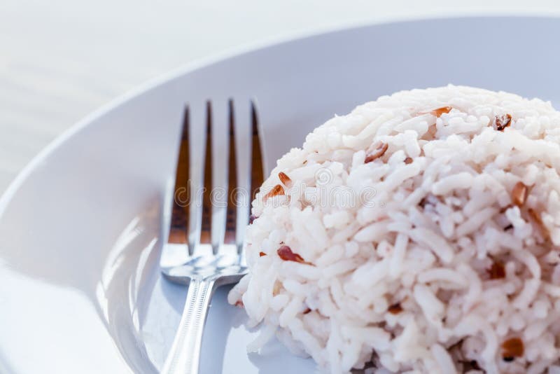 Some Images of Rice with Fork in White Dish Stock Photo - Image of ...