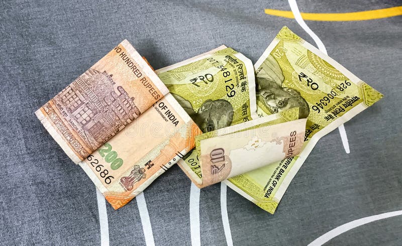 Some Indian Rupee Bank Notes of 200, 20 and 10 Stock Image - Image of ...