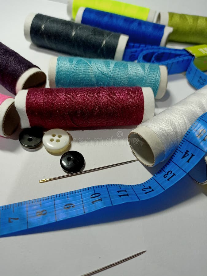 Some items for sewing stock image. Image of hand, blue - 231831351