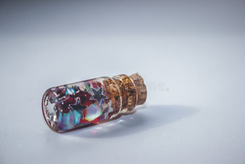 Some Little Glass Bottles with Dreams in the Spring Forest Stock Photo ...