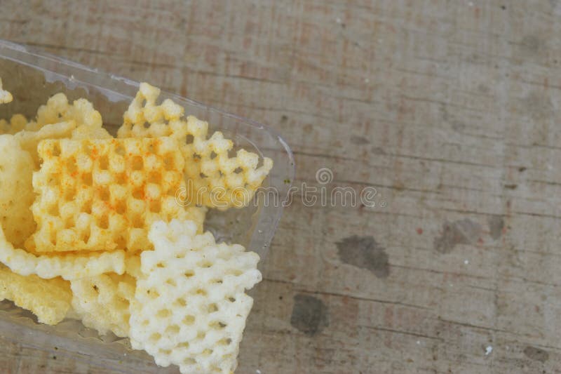 Some Mesh Chips in a Plastic Container Stock Photo - Image of isolated ...