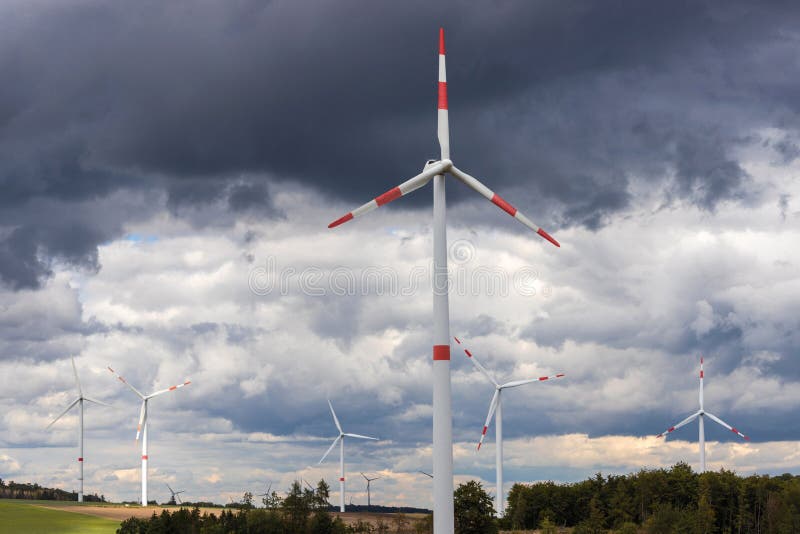 Modern Wind Wheels in Front of a Cloudy Storm Sky Landscape Stock Photo ...