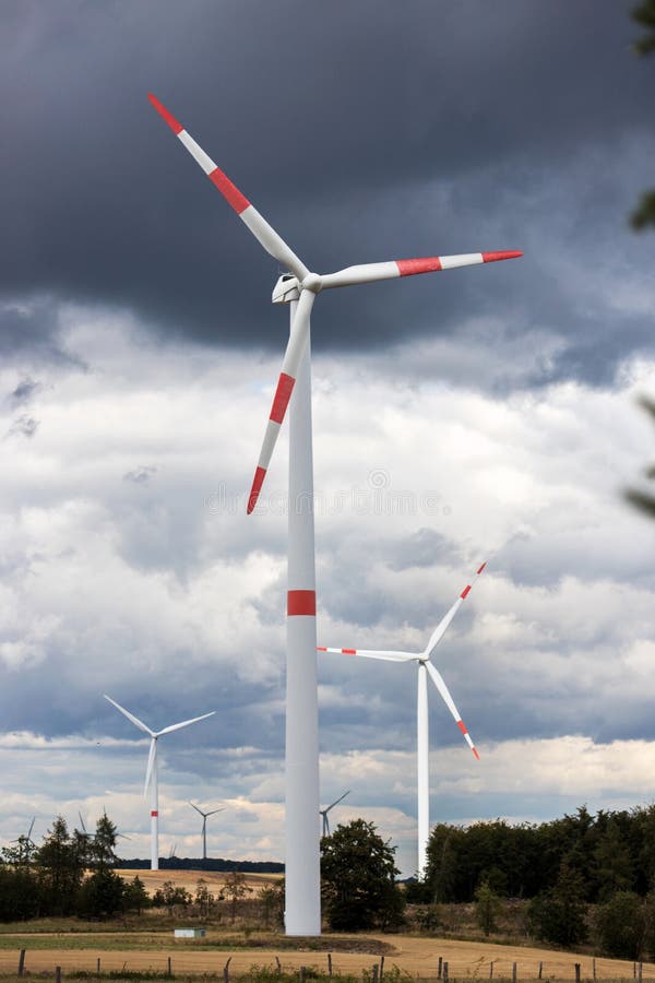 Modern Wind Wheels in Front of a Cloudy Storm Sky Landscape ...