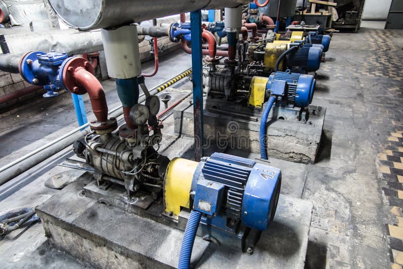 Some old pumps with motors stock image. Image of iron - 232039535
