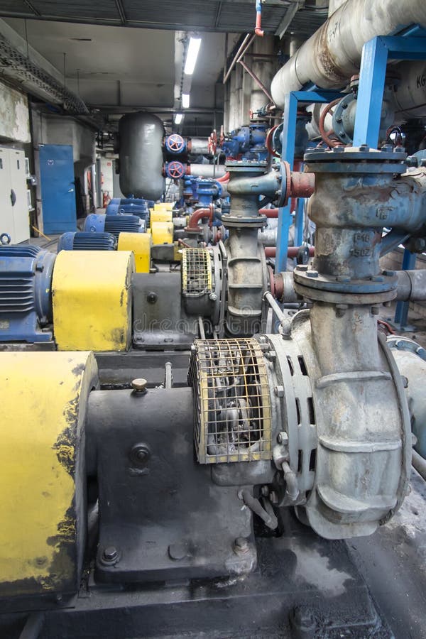 Some old pumps with motors stock image. Image of bearing - 232040089