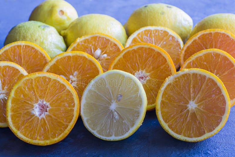 Some Orange Cut in Middle and a Half Lemon Stock Image - Image of ...