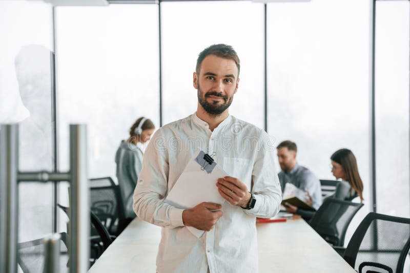 Some Paperwork. Team of Office Employees are Together Indoors Stock ...