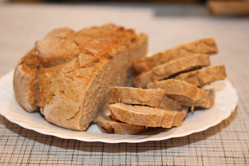 Some Pieces of Round Bread and a Half-loaf on the Place. Stock Image ...