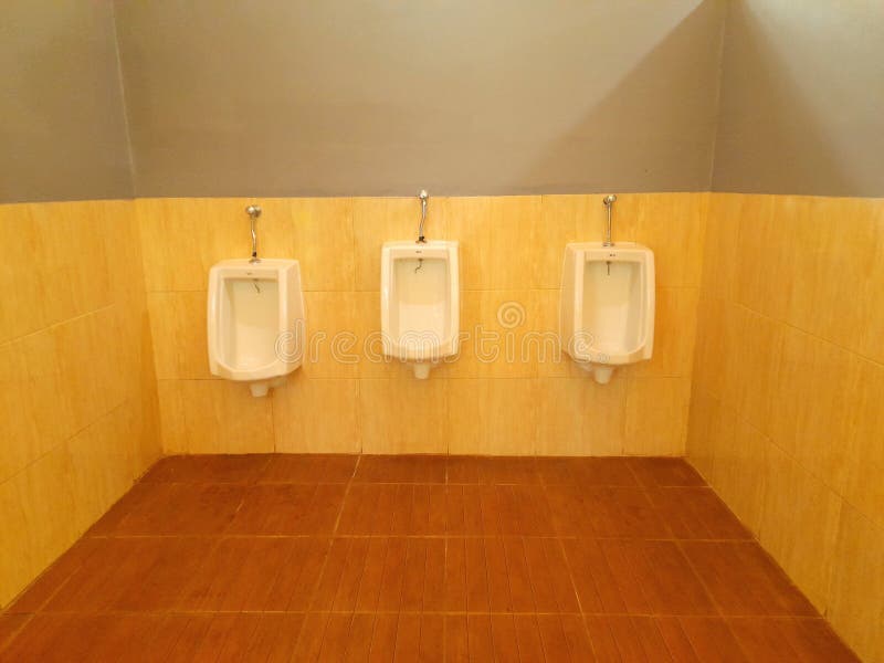 Some Places To Urinate in a Public Toilet Stock Photo - Image of wall ...