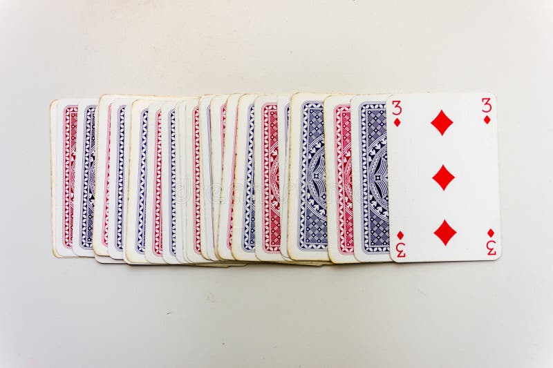 Playing cards on a table stock image. Image of cards - 328171689