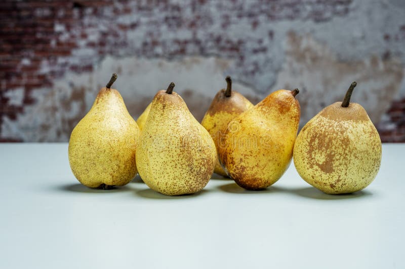 Some Ripe Pears on the Surface of a Subtle Soft Blue Color and ...