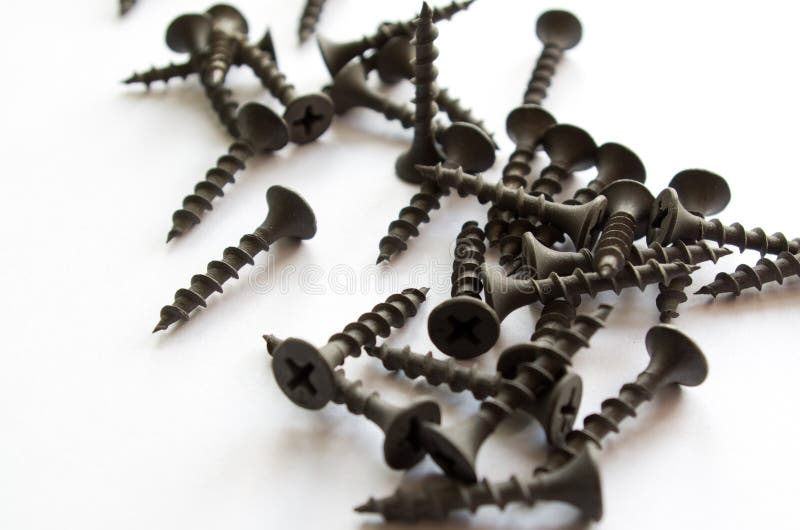 Some screws stock photo. Image of lying, black, table - 31518888