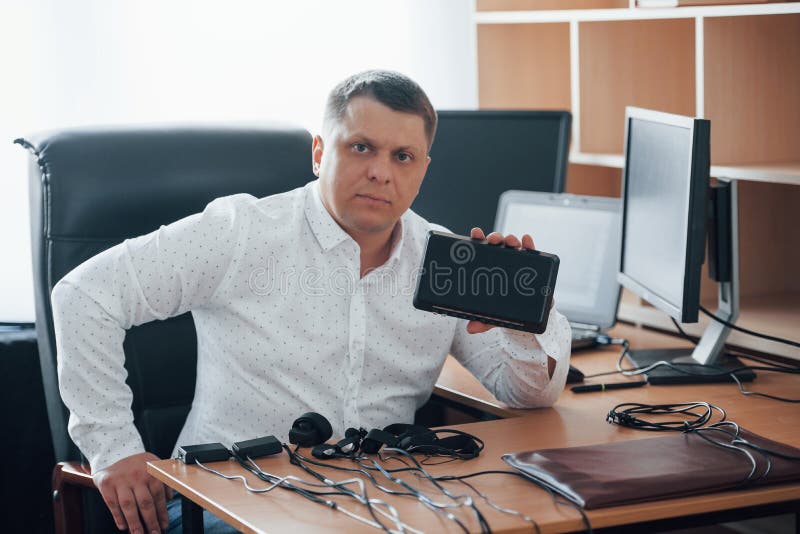 Some Serious Devices. Polygraph Examiner Works in the Office with His ...