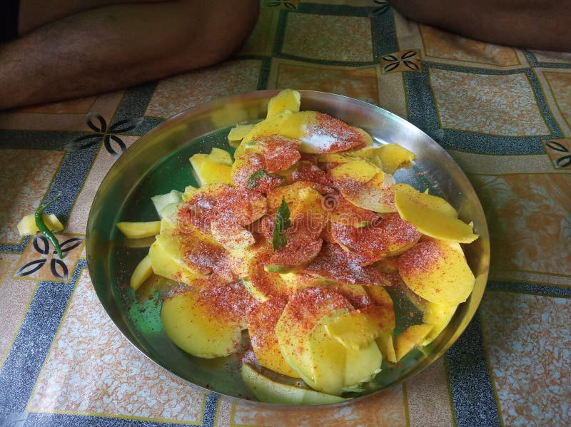 Some Slice of Yellow Mango with Red Powder Chilli and Mints Stock Image ...