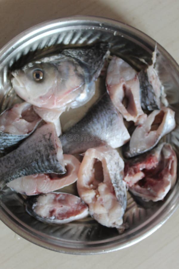 Some Slices of Fresh Raw Fish on a Plate Ready for Cooking Fish Curry ...