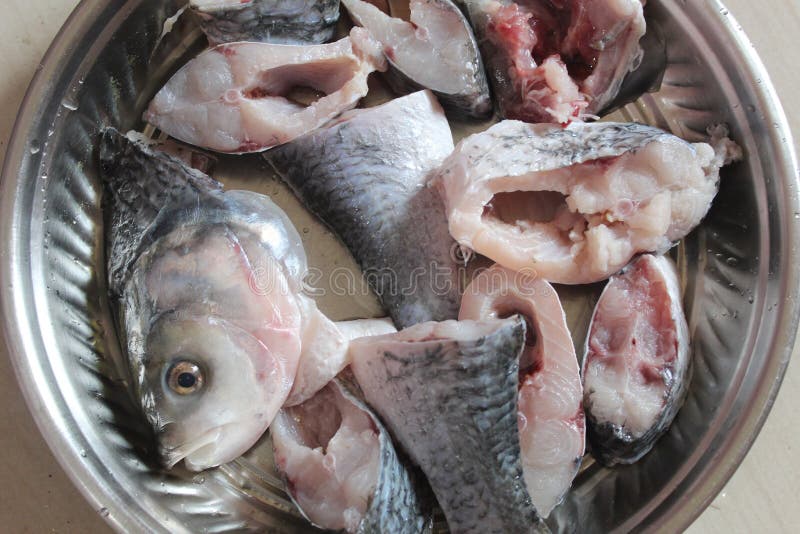 Some Slices of Fresh Raw Fish on a Plate Ready for Cooking Fish Curry ...