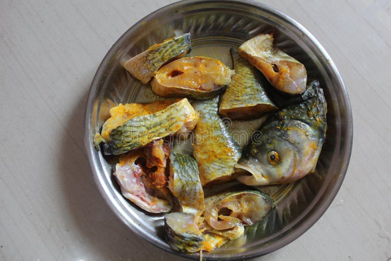 Some Slices of Fresh Raw Fish on a Plate Ready for Cooking Fish Curry ...