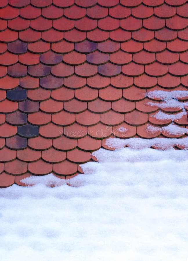 Some Snow on a Red Tiled Roof Stock Photo - Image of horseshoe, winter ...