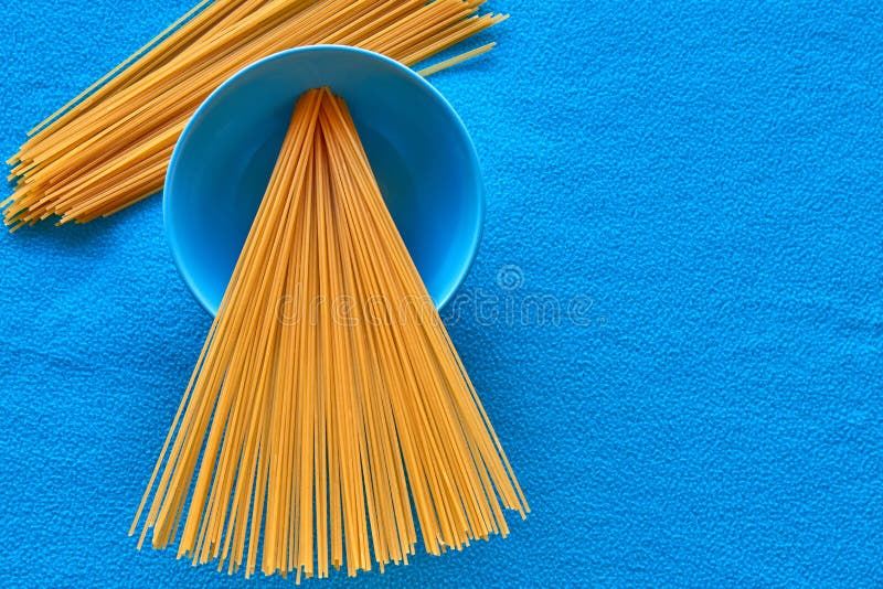 Some Spaghetti with Blue Background Stock Image - Image of ingredient ...
