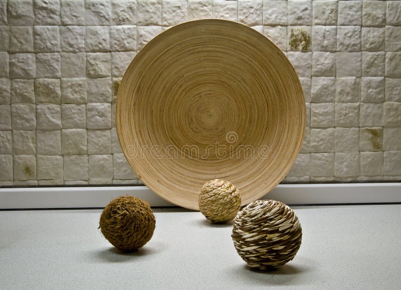 Some Straw Spheres and Wood Plate Still-life Stock Photo - Image of ...