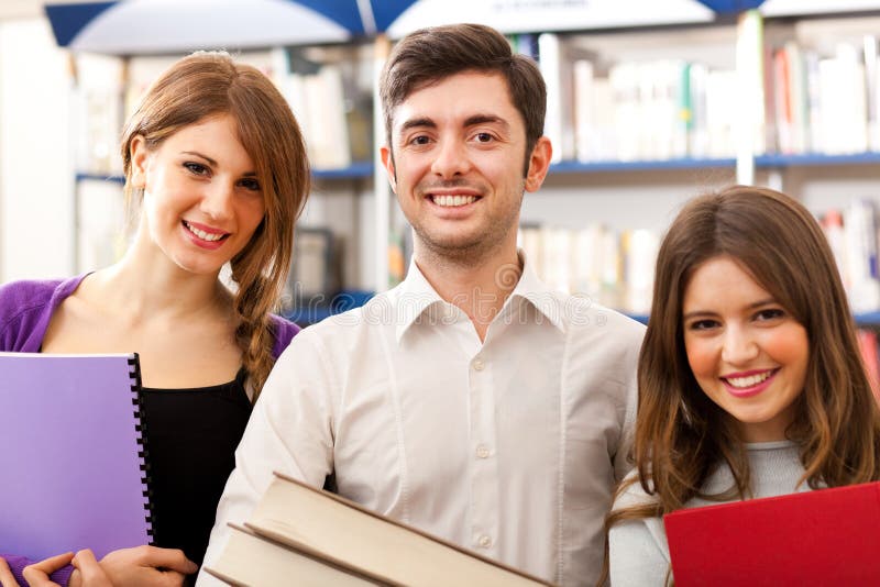 Students in a library stock photo. Image of male, shelf - 29838038