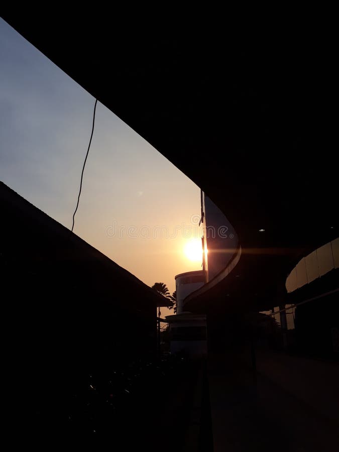 Some of the Sunlight, Which Creates a Silhouette Inside the Building ...