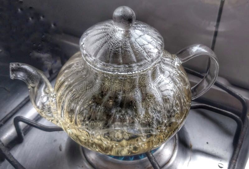 Some Tea is Boiling Jn the Glass Kettle on the Stove Stock Photo ...
