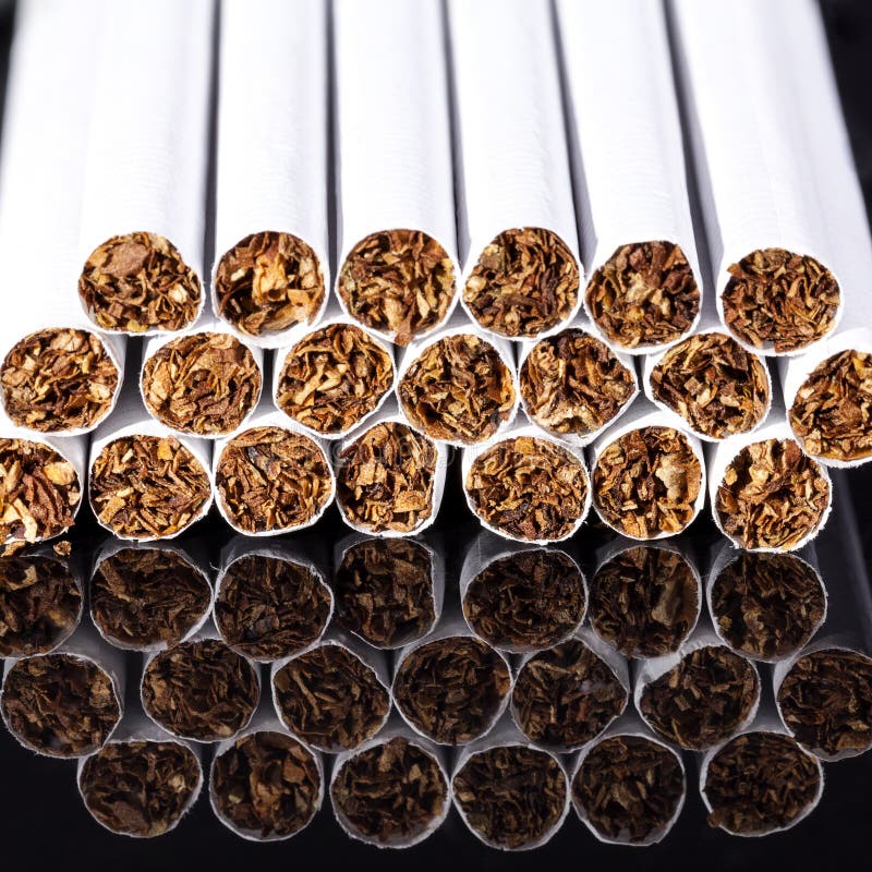 Two Thin Cigarettes Isolated On Black Background Macro Stock Photo ...