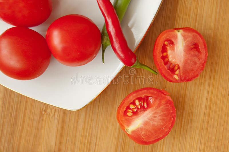 Some tomatoes and peppers stock image. Image of color - 10749401