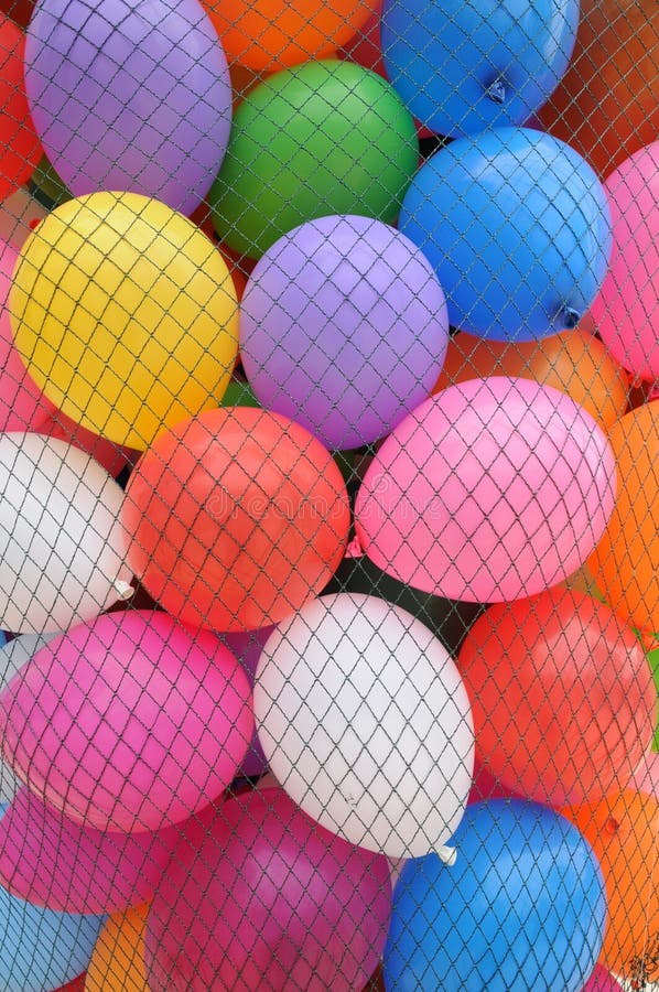 Toy balloons in a net editorial stock photo. Image of inflatable ...